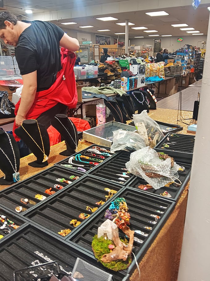 Jewelry displays glimmer with possibility, each tray a miniature museum of adornments waiting for their second chance at glamour.