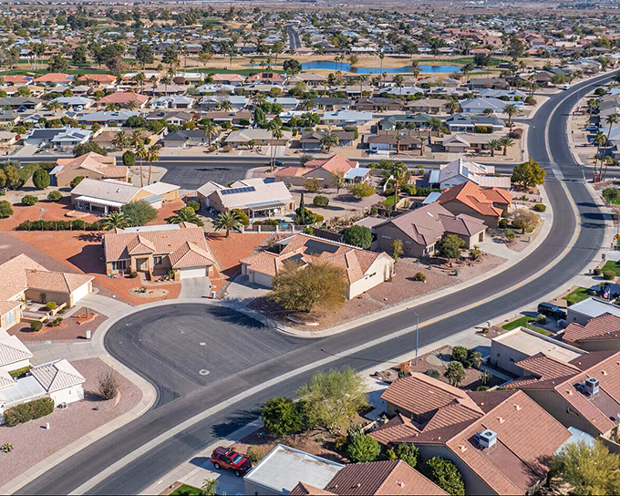 From above, Sun City West reveals its master-planned perfection. Wide streets, terracotta roofs, and not a rush hour in sight.