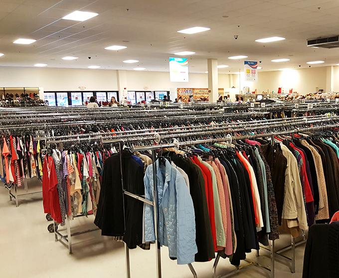 A sea of garments organized with military precision. Somewhere in this rainbow of fabric lies your next favorite outfit.