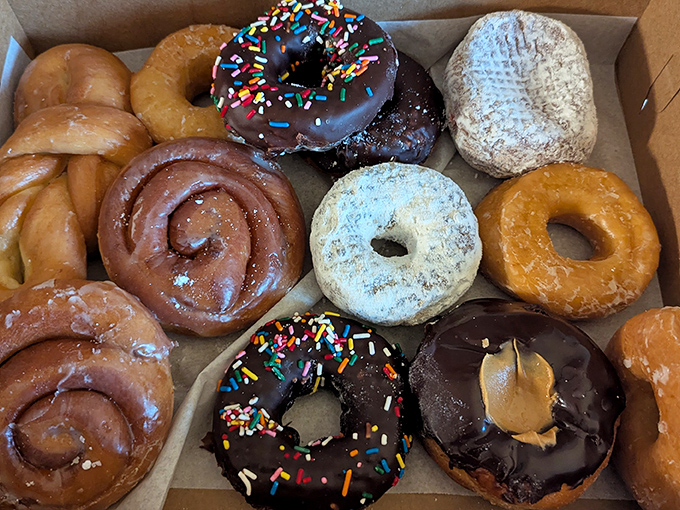 A dozen reasons to abandon your diet resolutions, neatly arranged in a box of pure, unadulterated joy.