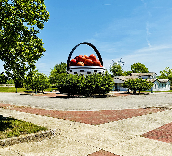 Looking up at the basket's massive handle feels like being in "Honey, I Shrunk the Kids: Ohio Edition." The craftsmanship is surprisingly impressive for something so wonderfully unnecessary.