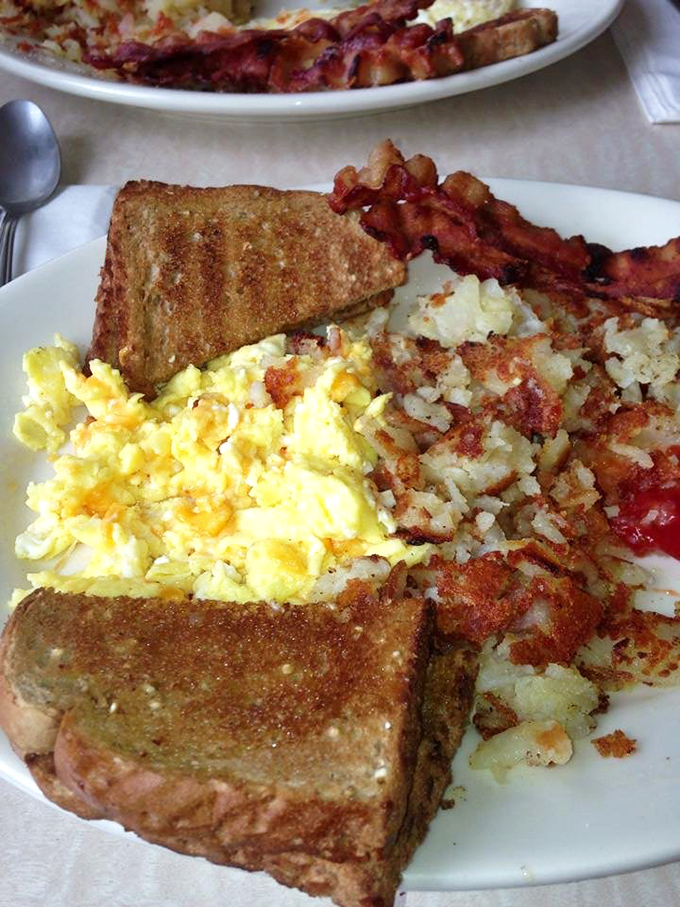 Breakfast perfection doesn't need fancy plating. Golden toast, perfectly crisp bacon, and eggs that would make a chicken proud&mdash;simple pleasures at their finest.