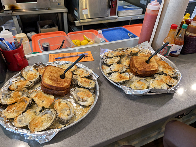 These baked oysters aren't just appetizers, they're little foil-lined boats of happiness, with each buttery, golden-topped shell delivering oceanic bliss.