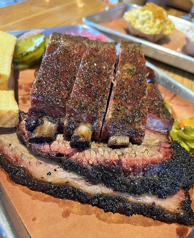 Brisket with a bark so perfect it deserves its own Instagram account, alongside ribs that make you question every other rib you've ever loved.