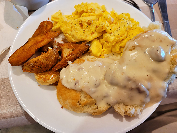 Biscuits and gravy that would make your grandmother both proud and jealous. That pepper-flecked gravy cascades like a comfort food waterfall.