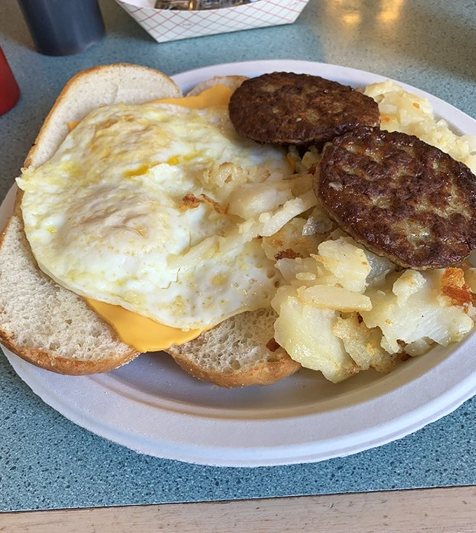 Breakfast engineering at its finest &ndash; perfectly cooked eggs, golden hash browns with that ideal crispy-to-fluffy ratio, and sausage patties that mean business.