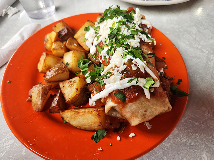 Not all heroes wear capes&mdash;some come wrapped in tortillas. This breakfast burrito, crowned with sour cream and salsa, might just save your morning.