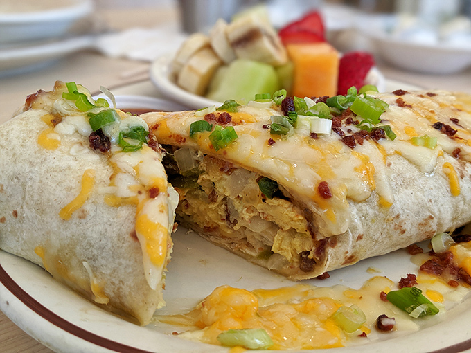 This breakfast burrito doesn't just satisfy hunger&mdash;it creates a spiritual experience. The melted cheese cascade and fresh scallions are just showing off.