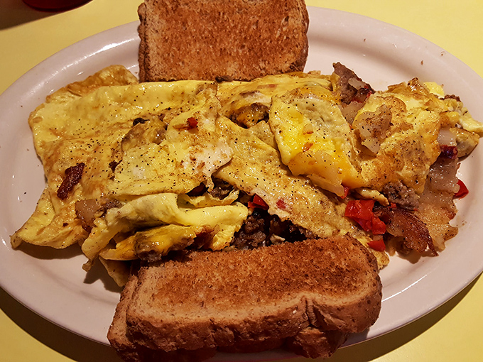 Breakfast alchemy at its finest: eggs, bacon, and toast transformed into something that makes hitting the snooze button a criminal offense.