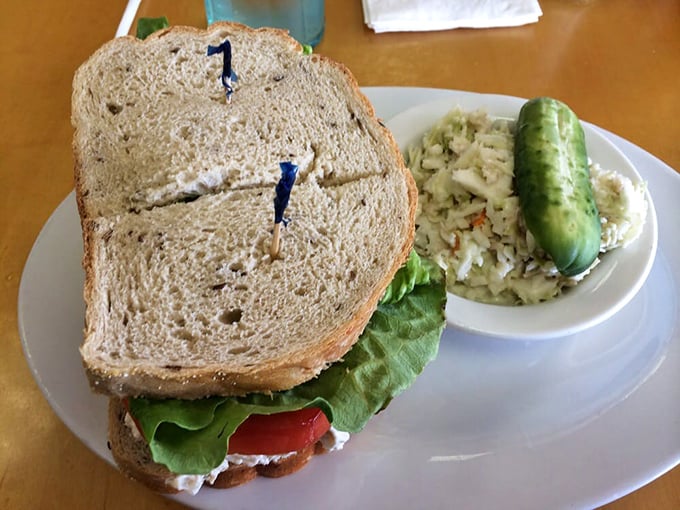 A sandwich that doesn't just satisfy hunger but resolves existential crises, paired with coleslaw that could win talent competitions.