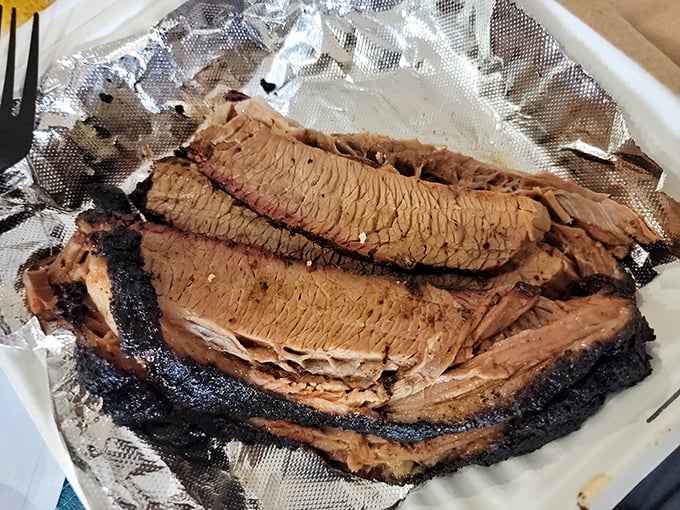 Behold the holy grail: brisket with that perfect pink smoke ring and bark so flavorful it should be illegal in at least seven states.
