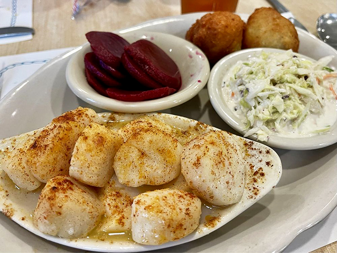 These broiled scallops aren't just cooked; they're transformed. The gentle seasoning lets the natural sweetness shine through like a seafood sonnet.