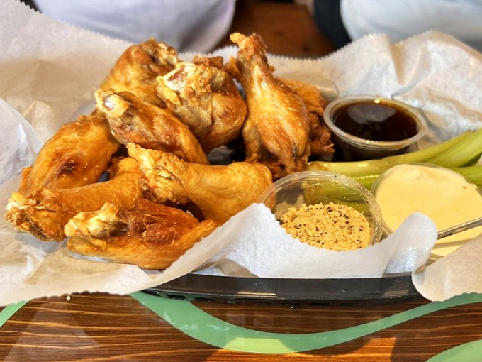 Golden-fried wings that could make Buffalo, NY jealous, served with enough heat to match the Florida sunshine outside.