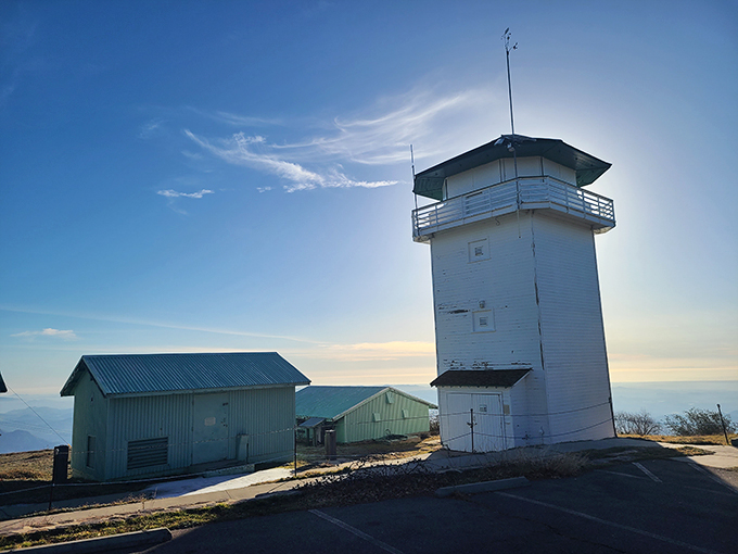 A weather station and lookout tower keep watch over the mountain. Less glamorous than a castle turret, but infinitely more useful in wildfire season.