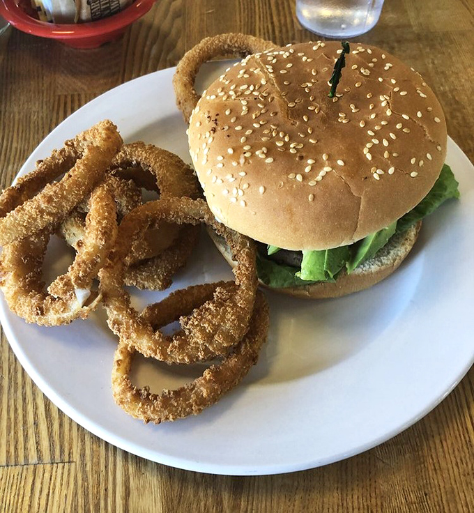 That perfect burger moment &ndash; when the sesame seed bun meets a juicy patty and those golden onion rings stand at attention.