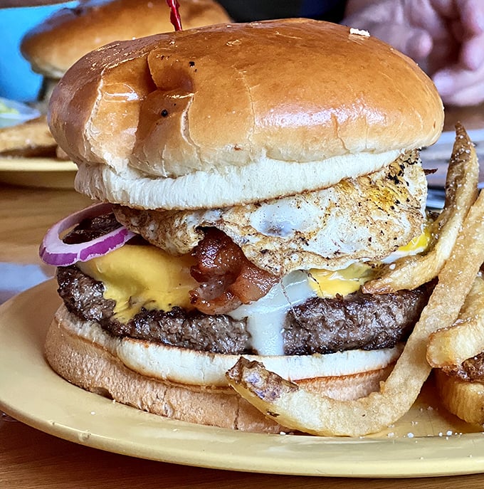 Behold the burger in its natural habitat&mdash;towering, juicy, and demanding both hands and your full attention. Architecture you can eat.