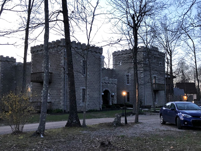 Morning reveals the castle's impressive silhouette against bare winter trees, proving that even in Ohio, you can wake up feeling like medieval nobility.