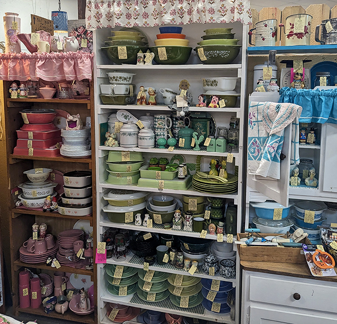 Pyrex paradise! For vintage kitchenware enthusiasts, this display is the equivalent of finding the Holy Grail &ndash; in avocado green, harvest gold, and flamingo pink.