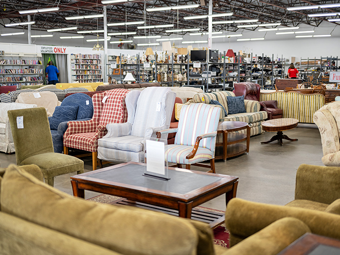 The furniture section resembles a living room United Nations, where mid-century mustard meets country plaid in perfect secondhand harmony.