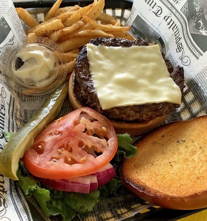 The star of the show! This cheeseburger doesn't need a fancy pedigree or artisanal backstory&mdash;it simply delivers pure, unadulterated pleasure.
