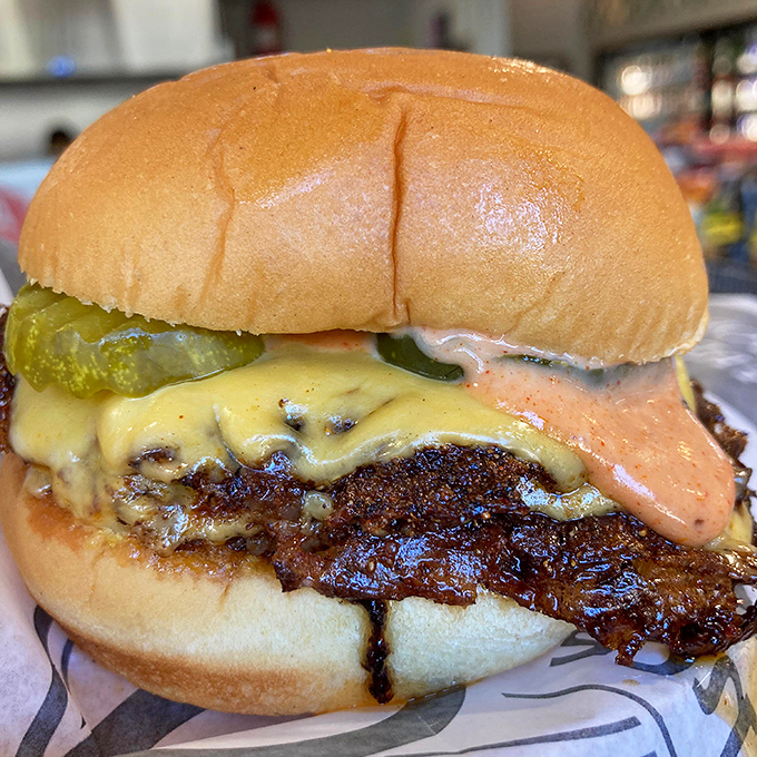 Behold the star of the show! Those crispy, lacy edges on the smashed patty are what burger dreams are made of.