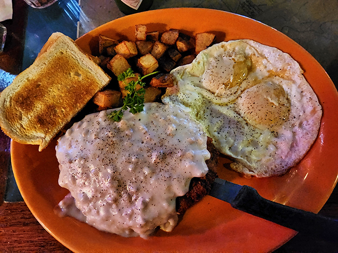 Chicken fried steak smothered in country gravy that would make your Southern grandmother weep with joy, alongside eggs and potatoes that complete the holy trinity of breakfast.