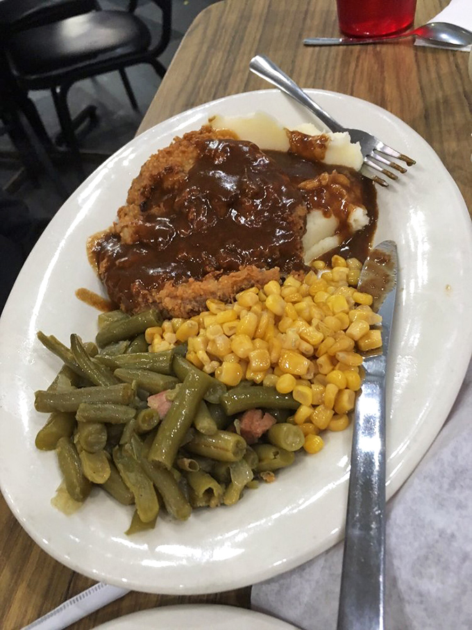 This isn't just chicken fried steak&mdash;it's a masterclass in comfort food engineering, with gravy cascading over crispy breading like a savory waterfall.