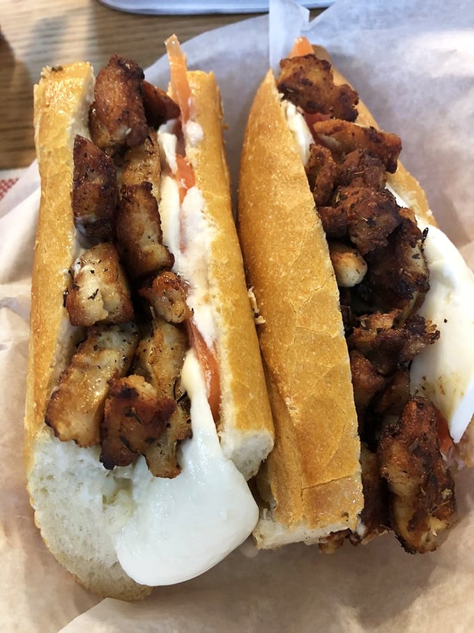 This chicken sandwich isn't just lunch&mdash;it's architecture. Perfectly seasoned meat nestled in a crusty baguette that shatters with each blissful bite.