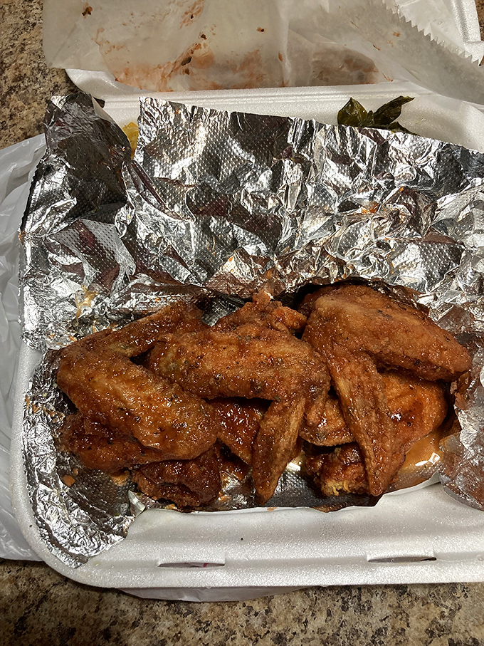 These wings aren't just cooked, they're transformed&mdash;glistening with sauce that strikes the perfect balance between sweet, heat, and pure magic.