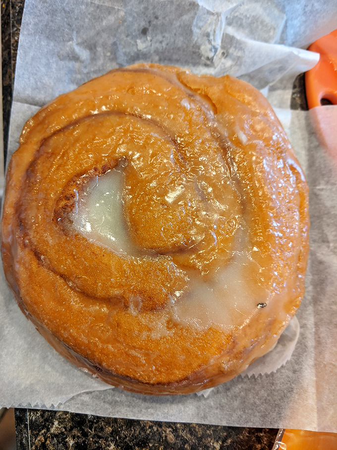 This cinnamon roll isn't just breakfast&mdash;it's an edible hug with a sweet glaze smile that says "good morning" better than coffee ever could.