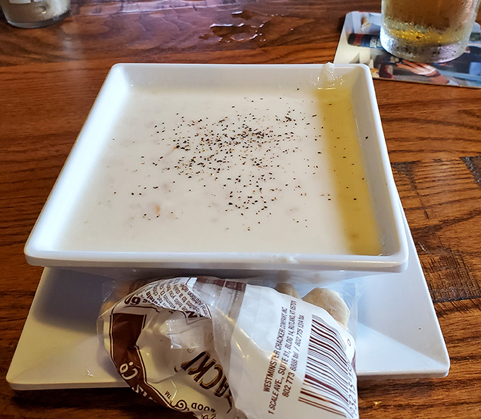 This chowder arrives looking innocent, but that first spoonful reveals its creamy, peppery secrets.