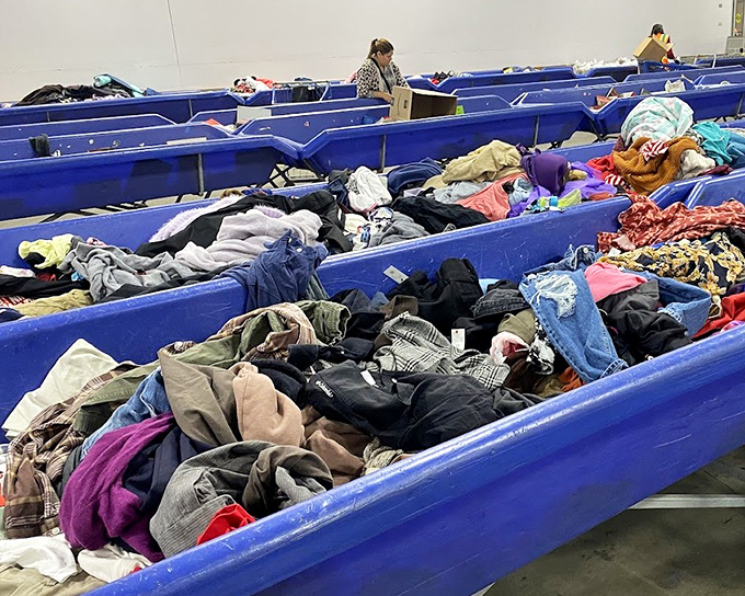 Ocean-blue bins create waves of fabric possibilities&mdash;each layer potentially hiding that perfect cashmere sweater or vintage band tee.