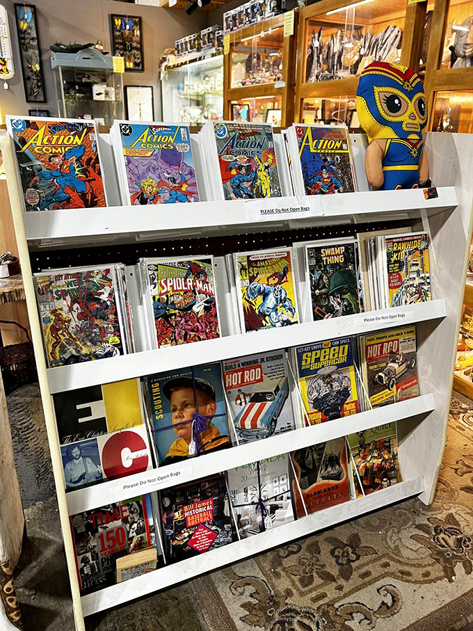 Action Comics and Spider-Man await their next adventure while a colorful mask watches over everything.