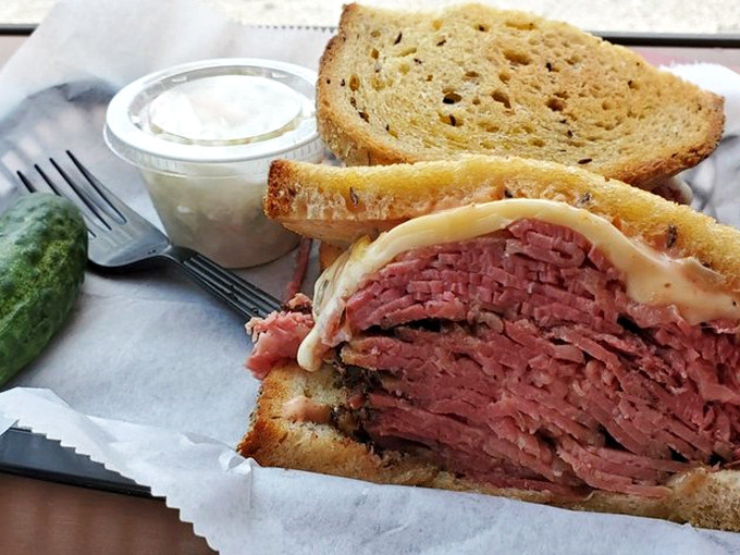 Not so much a sandwich as an engineering marvel. The corned beef-to-bread ratio here would make Einstein reconsider relativity.