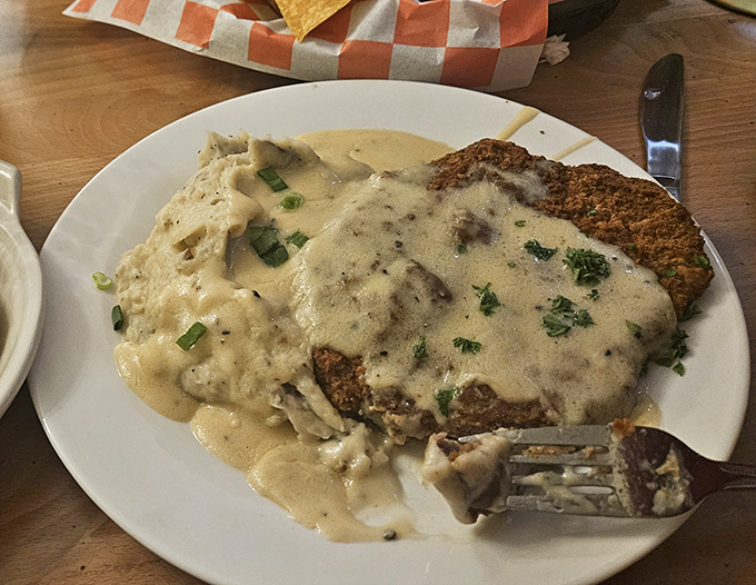 The star of the show: country fried steak swimming in peppery cream gravy that could make a vegetarian question their life choices.