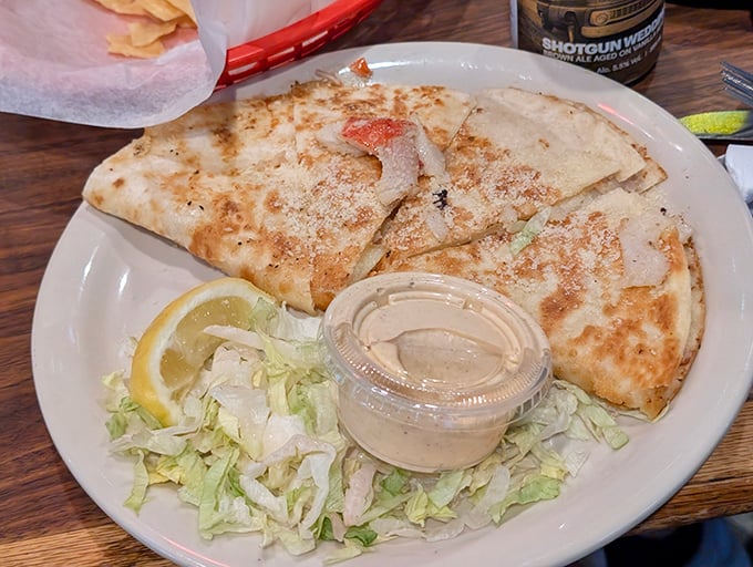 This quesadilla doesn't just whisper "cheese"—it belts it out like Aretha Franklin. Crispy, gooey, and served with a side of happiness.