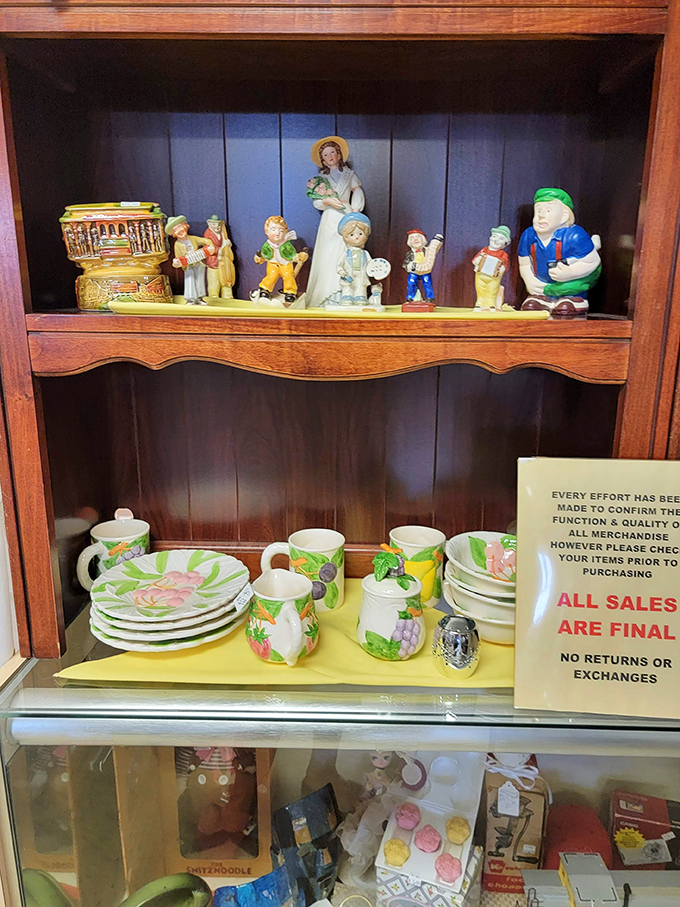 Explore a charming collection of vintage figurines and colorful fruit-patterned dishware as you browse through these unique, pre-loved hidden treasures.