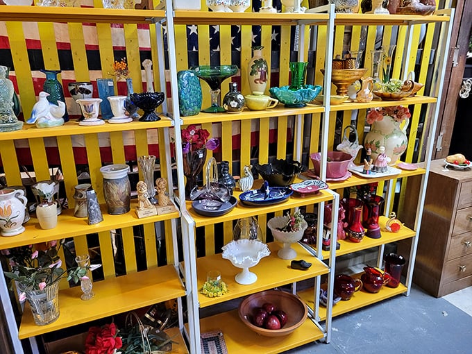 Colorful ceramics and glassware arranged with artistic precision &ndash; like a museum where everything has a price tag and a story to tell.