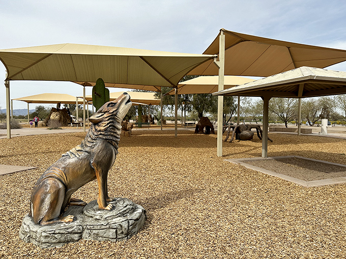 Desert whimsy at its finest &ndash; this coyote sculpture howls silently at the sky, welcoming families to a playground where imagination runs wild.