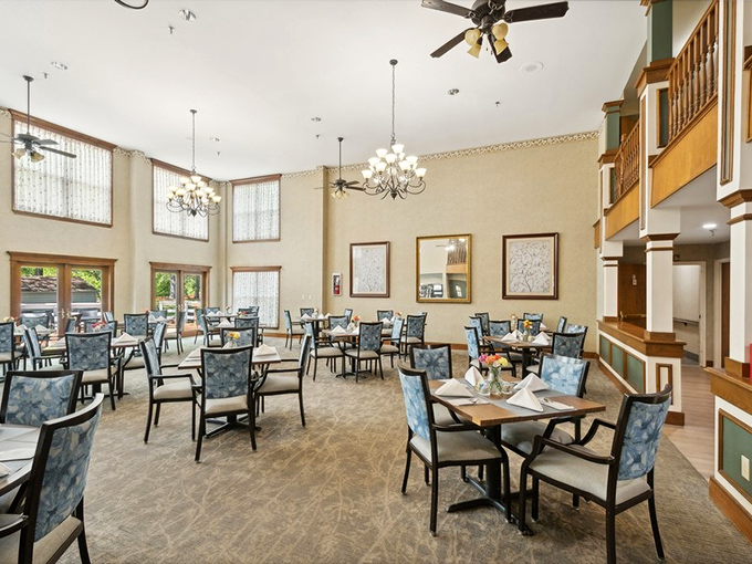 Dining with dignity! Elegant chandeliers, linen tablecloths, and not a plastic tray in sight. This is where conversations flow as smoothly as the coffee.