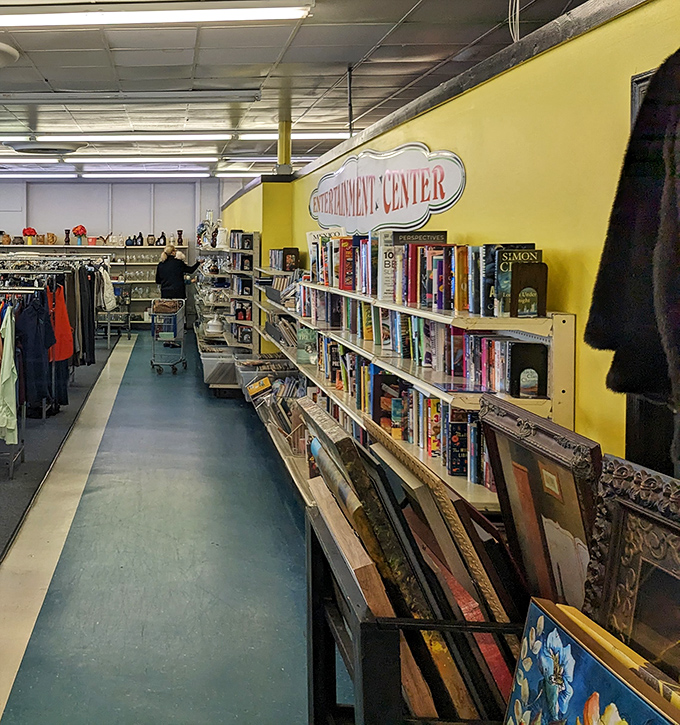 The "Entertainment Center" sign promises exactly what it delivers—hours of browsing bliss through books, movies, and forgotten cultural artifacts.