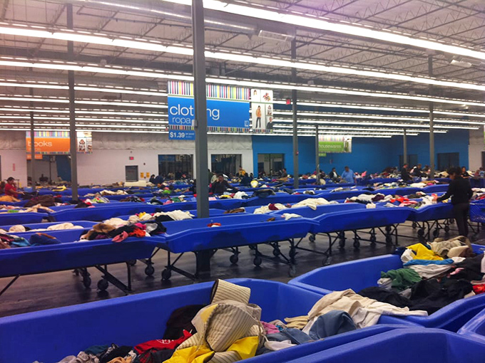 Row after row of blue treasure islands, where yesterday's discards become tomorrow's prized possessions. The thrill of the hunt is palpable.
