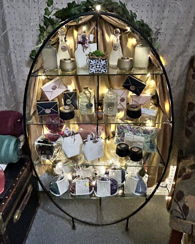 Elegantly displayed jewelry and crystals catch the light in this artful setup&mdash;proof that even flea markets have their museum-worthy moments.