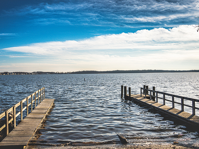 Wooden pathways to watery dreams. These twin docks invite both contemplation and adventure&mdash;choose your own Maryland maritime story.