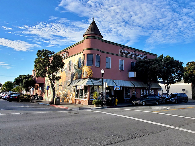 Downtown Half Moon Bay's historic buildings stand as cheerful sentinels of small-town America, complete with that pink corner landmark.