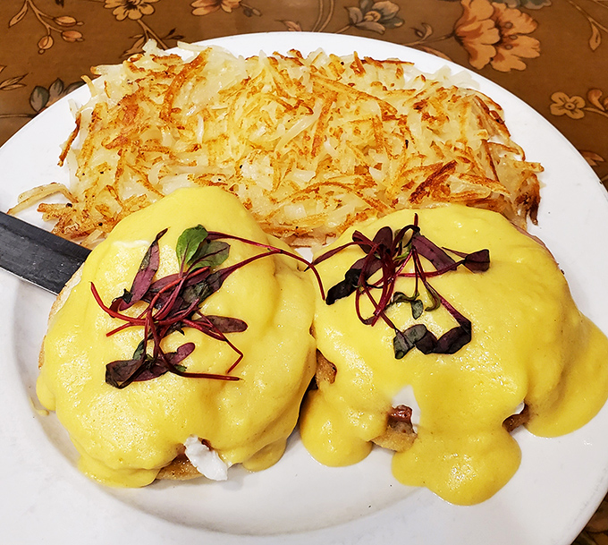 Eggs Benedict that would make a French chef weep with joy&mdash;golden hollandaise cascading over English muffins like a breakfast waterfall.