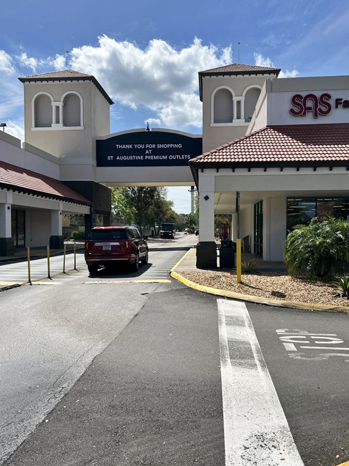 Thank you for shopping indeed &ndash; the exit arch feels like a victory gateway after a successful day of retail conquests.