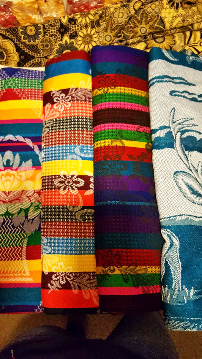 Textile treasures in every hue imaginable. These vibrant fabrics tell stories from around the world while waiting to become part of yours.
