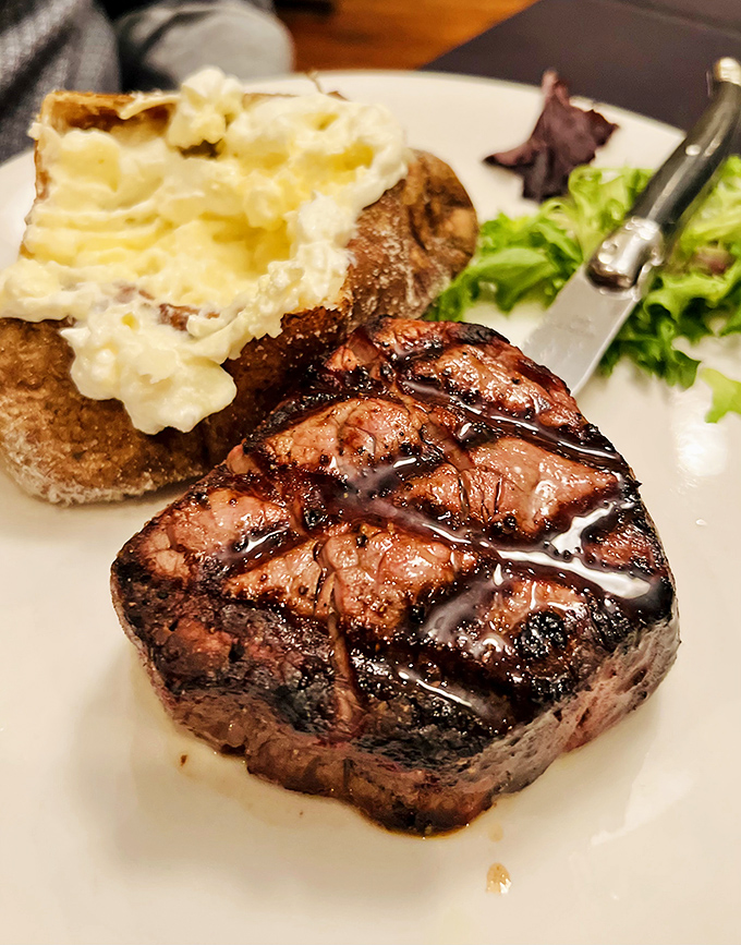 This isn't just a steak; it's a masterpiece of culinary art. The filet mignon's perfect sear gives way to buttery tenderness that might bring a tear to your eye.