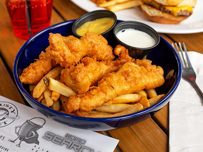 Golden-battered haddock that shatters with each bite, nestled alongside perfectly crisp fries&mdash;this isn't just fish and chips, it's edible poetry.